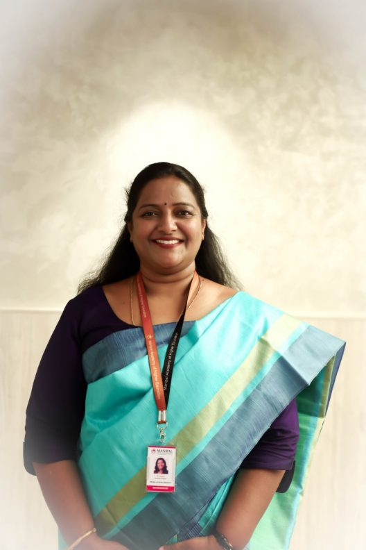 Dr. Anuja S